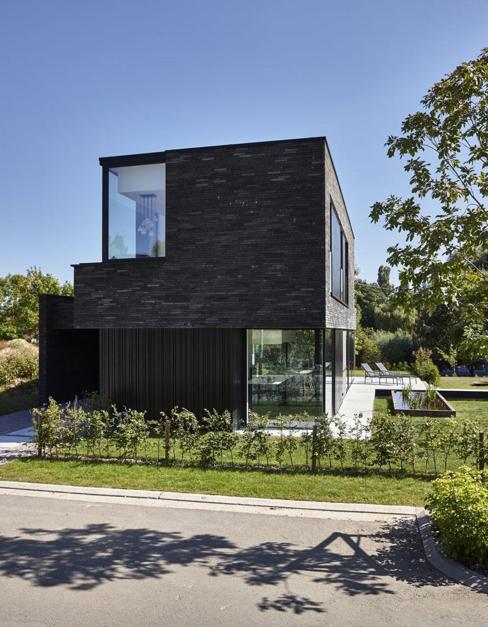 Sleek villa with gray facade stone