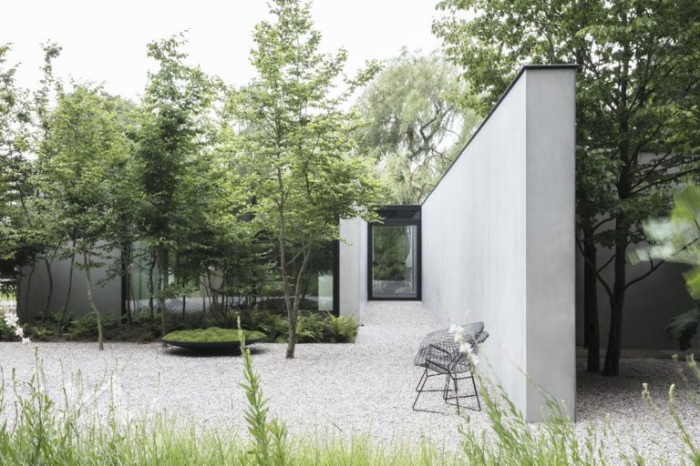 Modern concrete construction with large glass surfaces