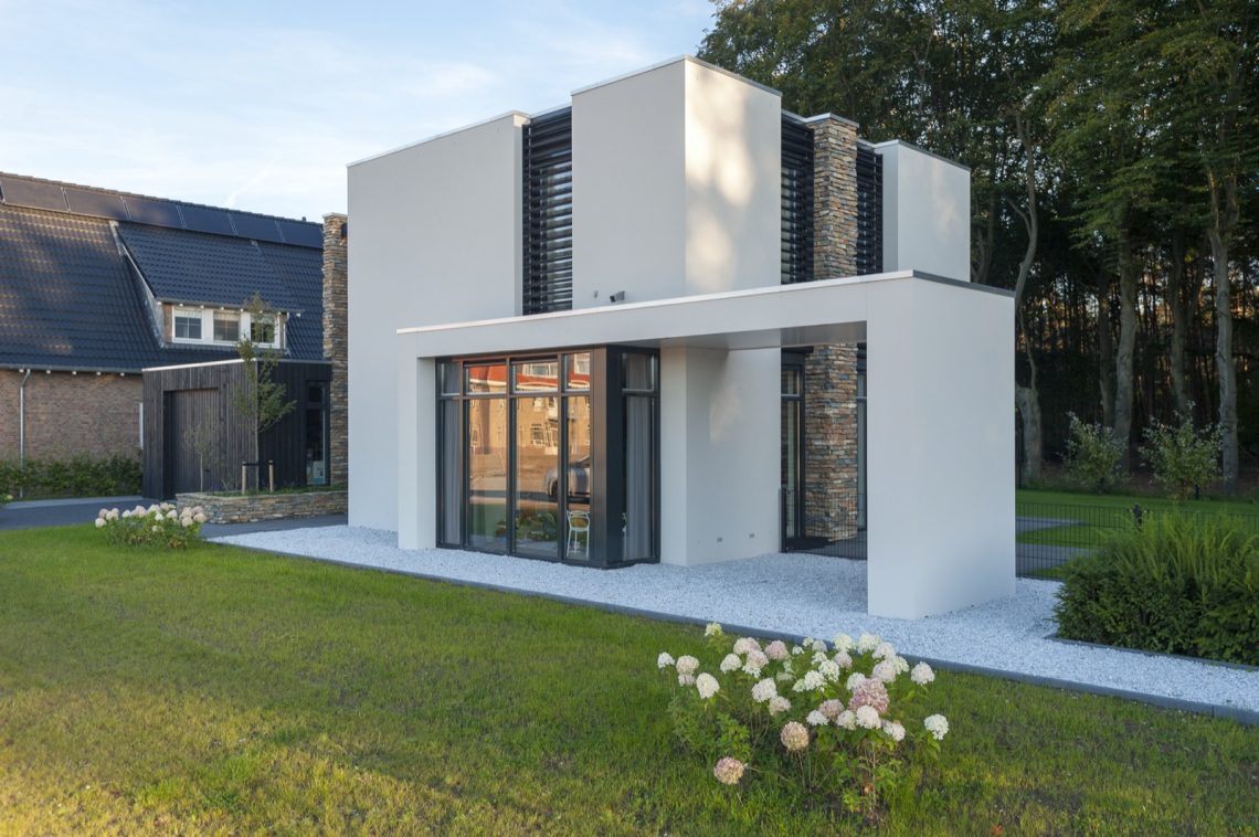 Cubist house with natural stone facade in Ede