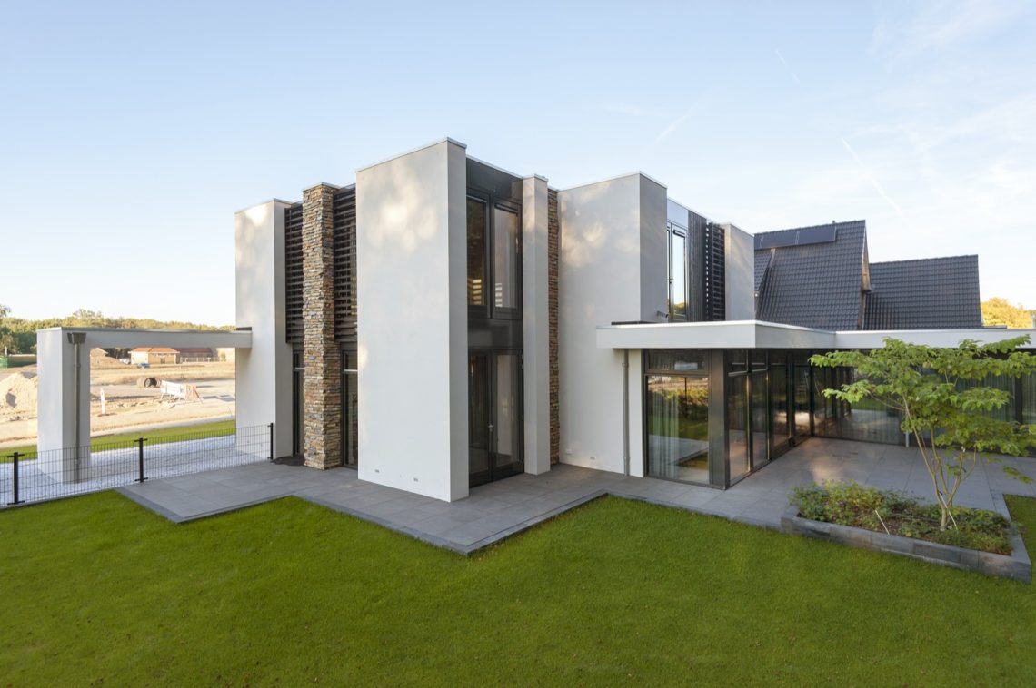 Cubist house with natural stone facade in Ede