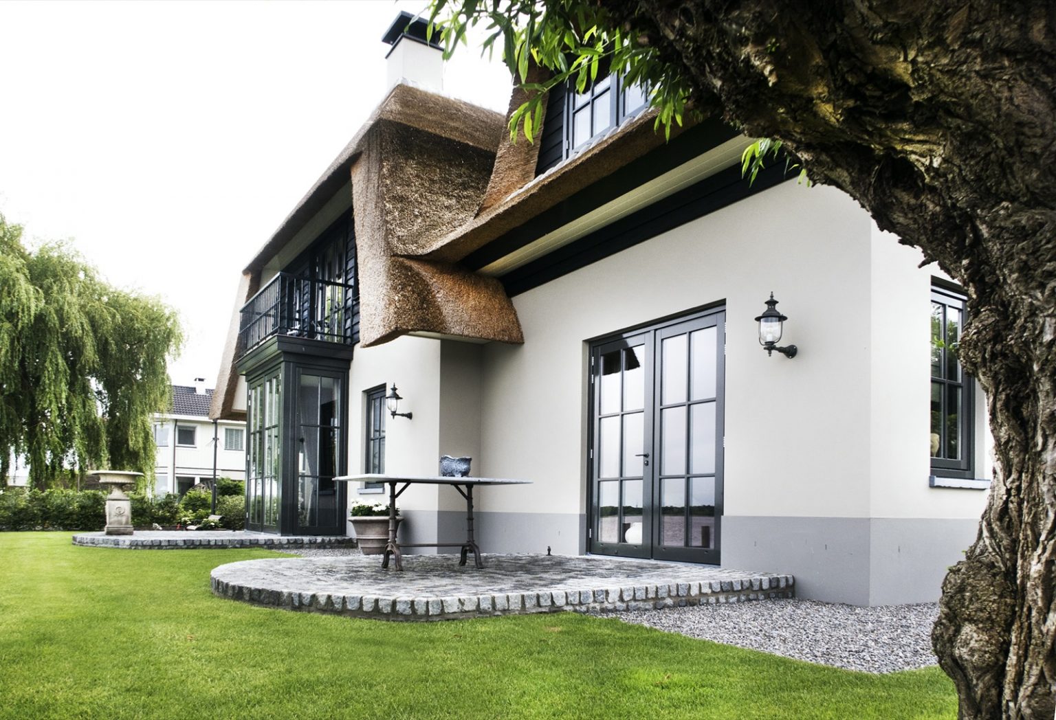 Thatched classic home with contemporary details