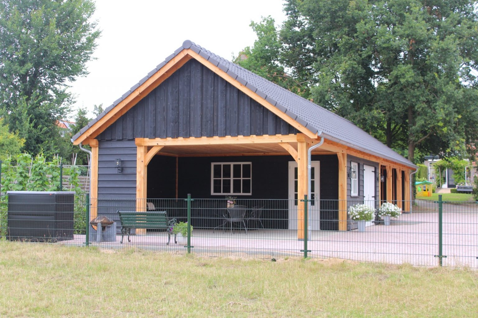Large wooden shed with canopy, carport, workshop and attic