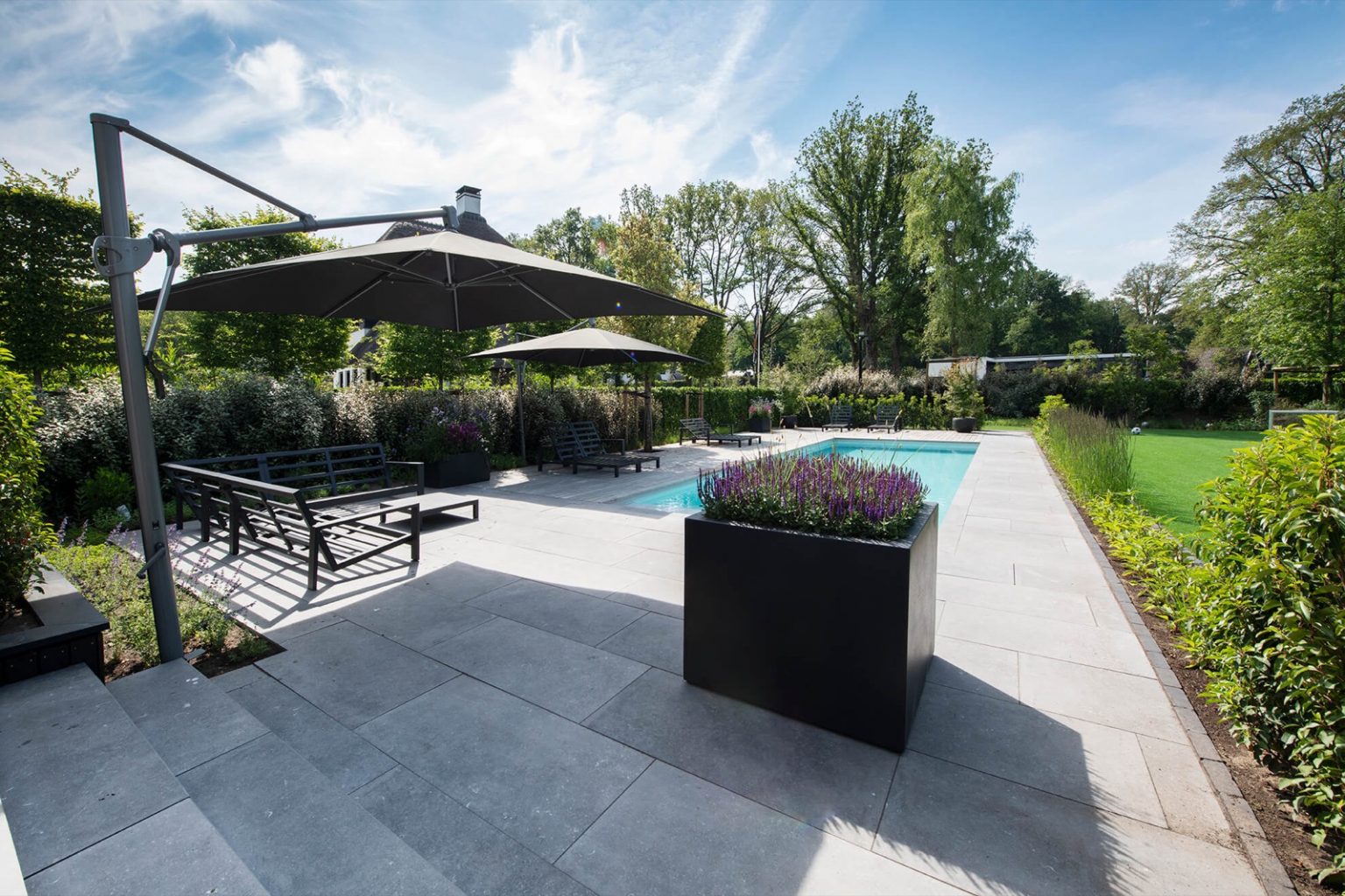 Swimming pool with stylish terrace - HOOG.design - Exclusive living ...