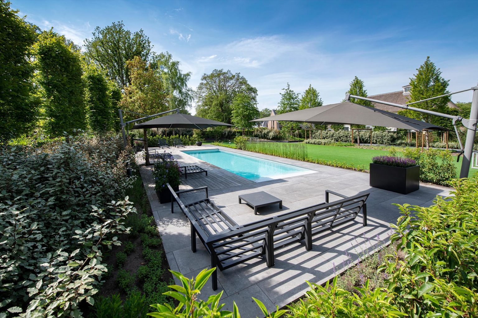 Swimming pool with stylish terrace - HOOG.design - Exclusive living ...