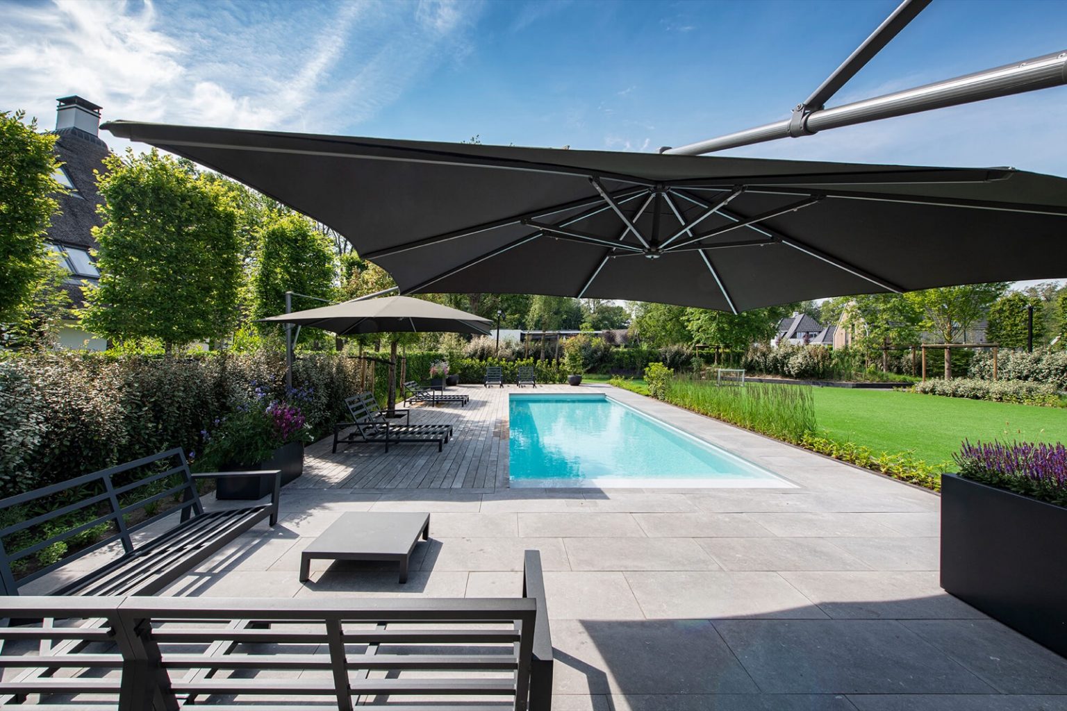 Swimming pool with stylish terrace - HOOG.design - Exclusive living ...