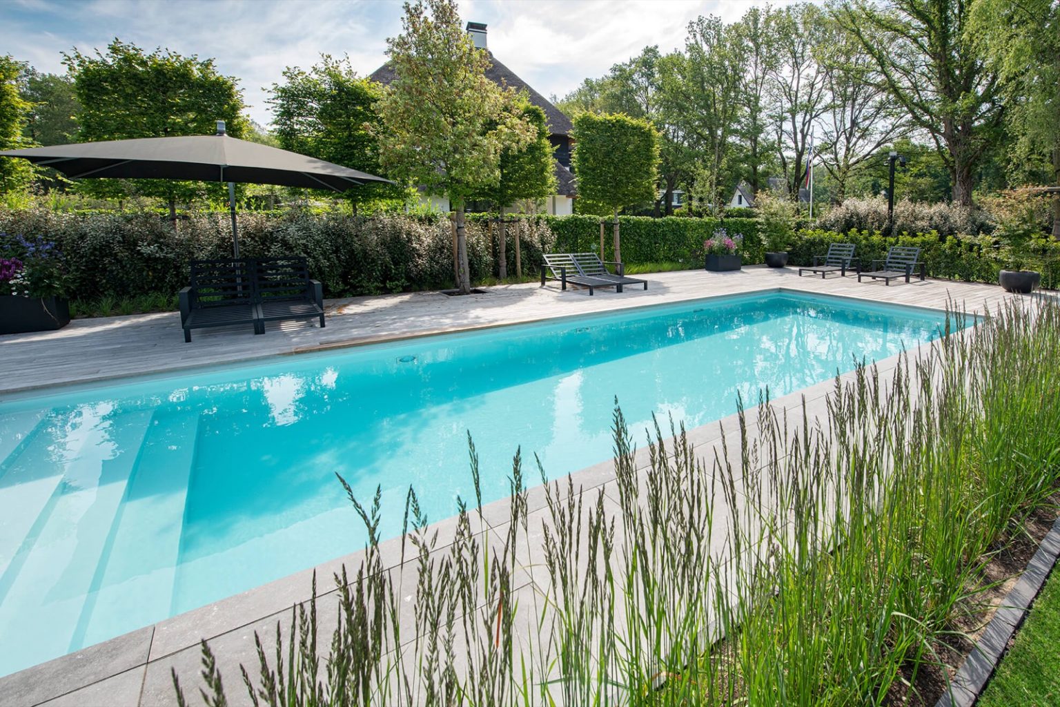 Swimming pool with stylish terrace - HOOG.design - Exclusive living ...