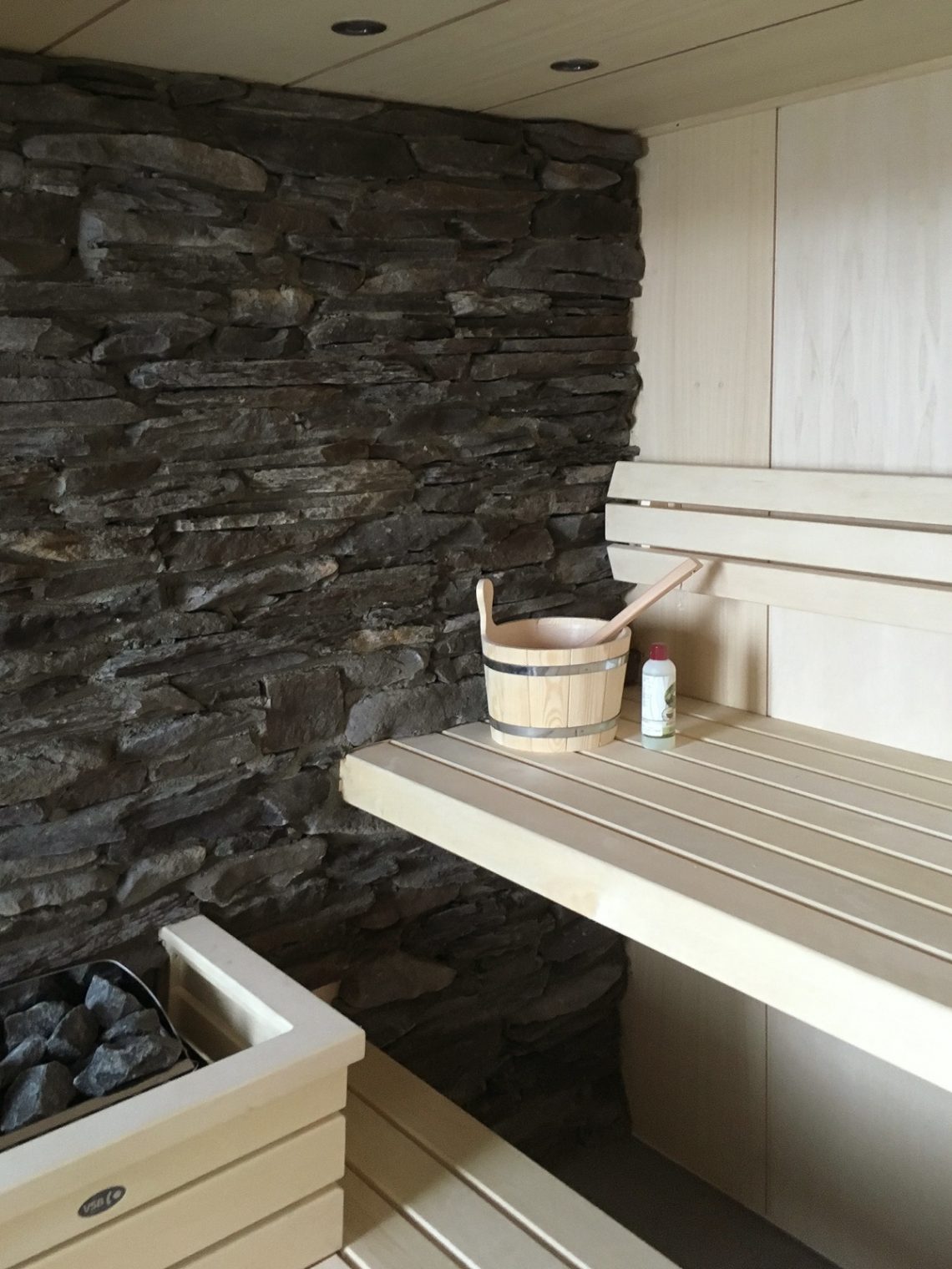Sauna with stone trips