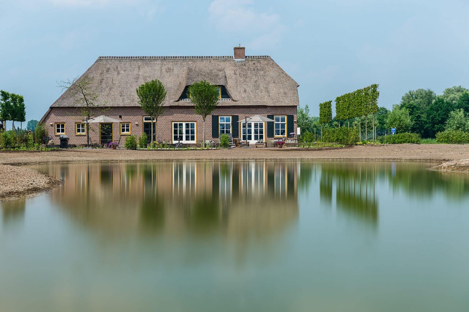 Farm garden with natural pond