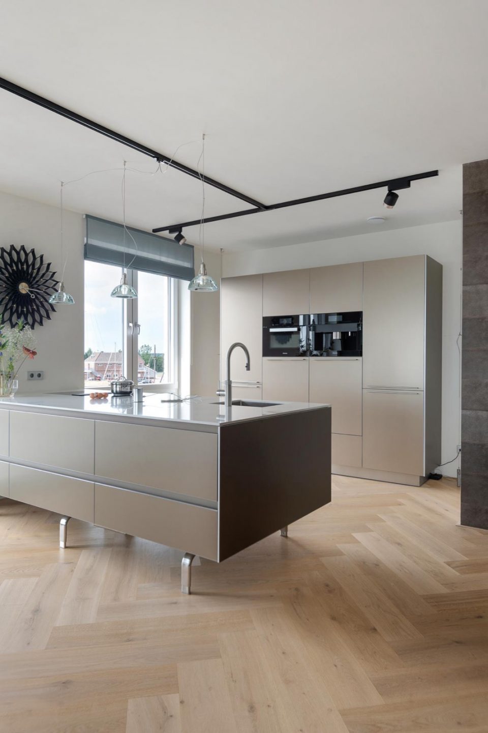 Aluminum bulthaup b3 kitchen in the color champagne