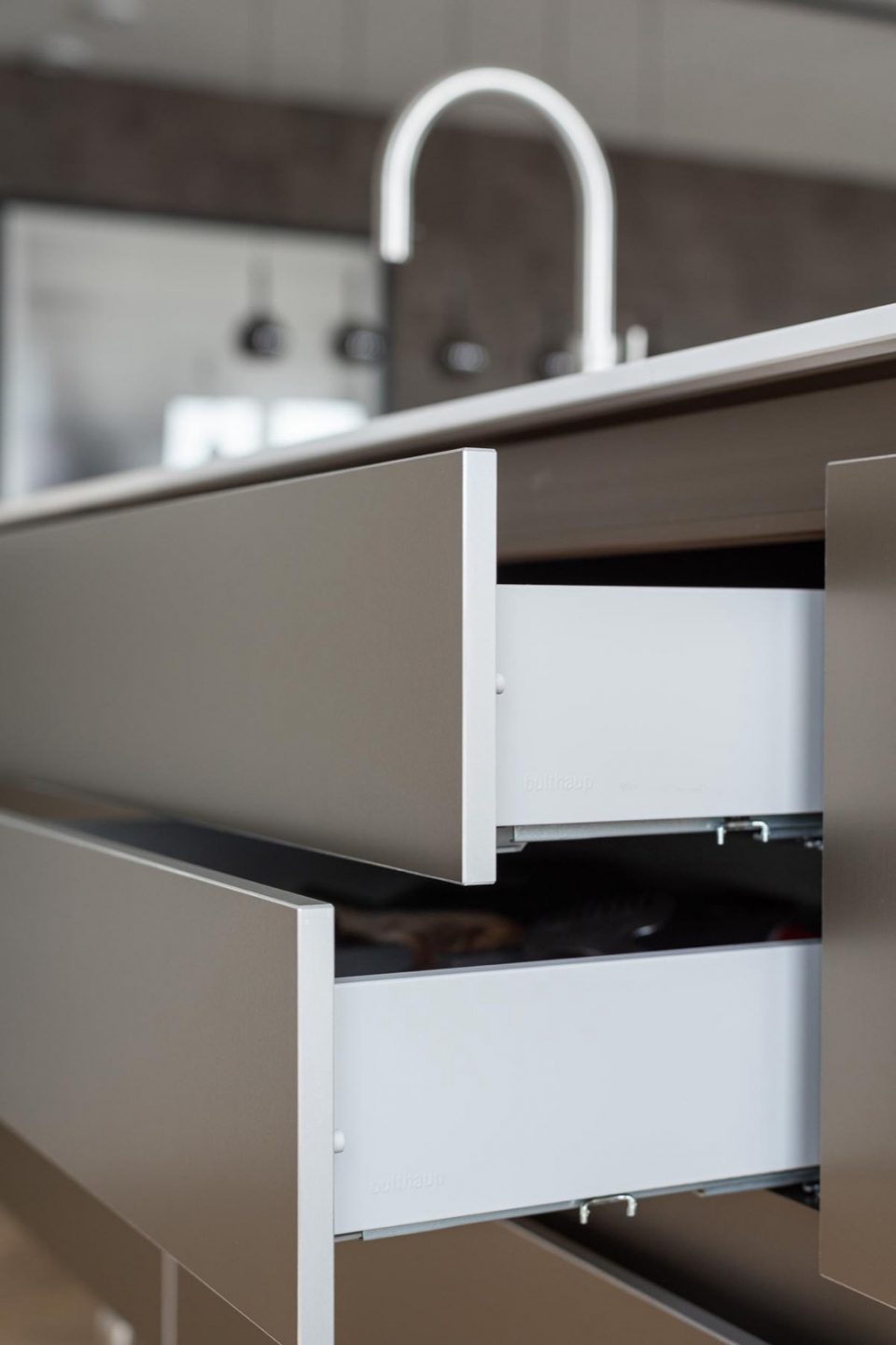Aluminum bulthaup b3 kitchen in the color champagne
