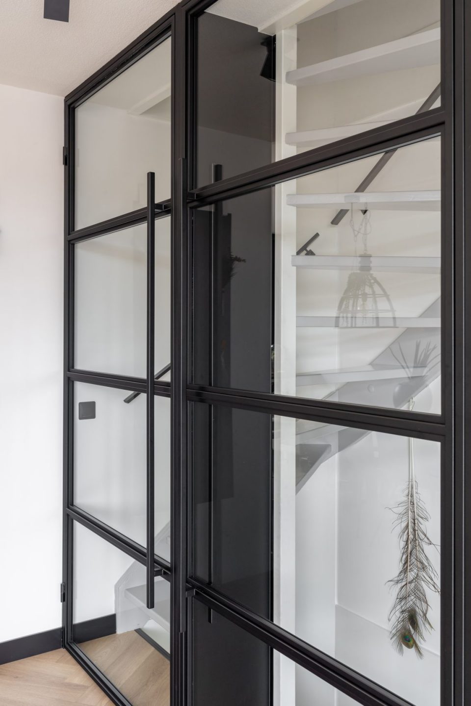 Steel staircase conversion with two hinged doors