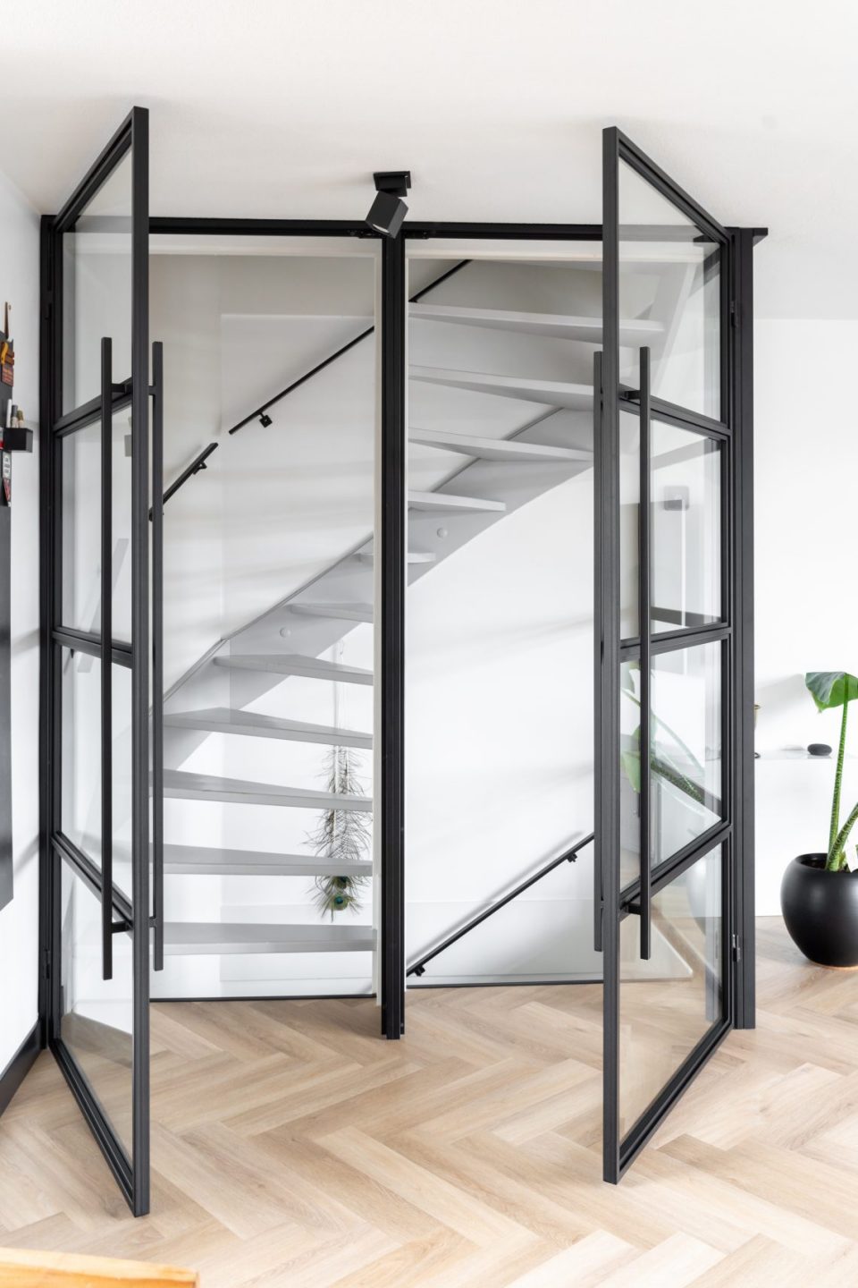 Steel staircase conversion with two hinged doors
