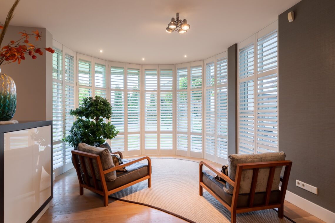 Round bay window with attractive shutters