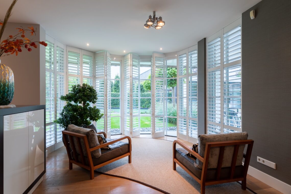 Round bay window with attractive shutters