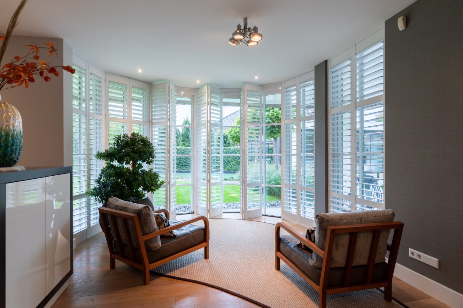 Round bay window with attractive shutters