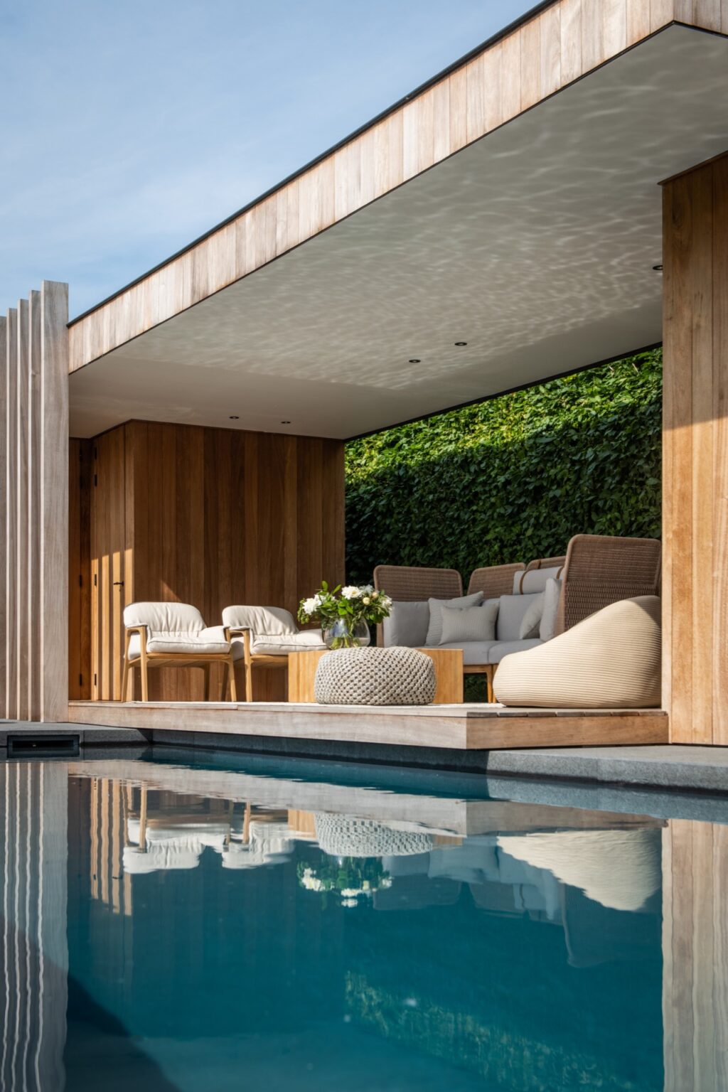 Pool house with luxury outdoor furniture