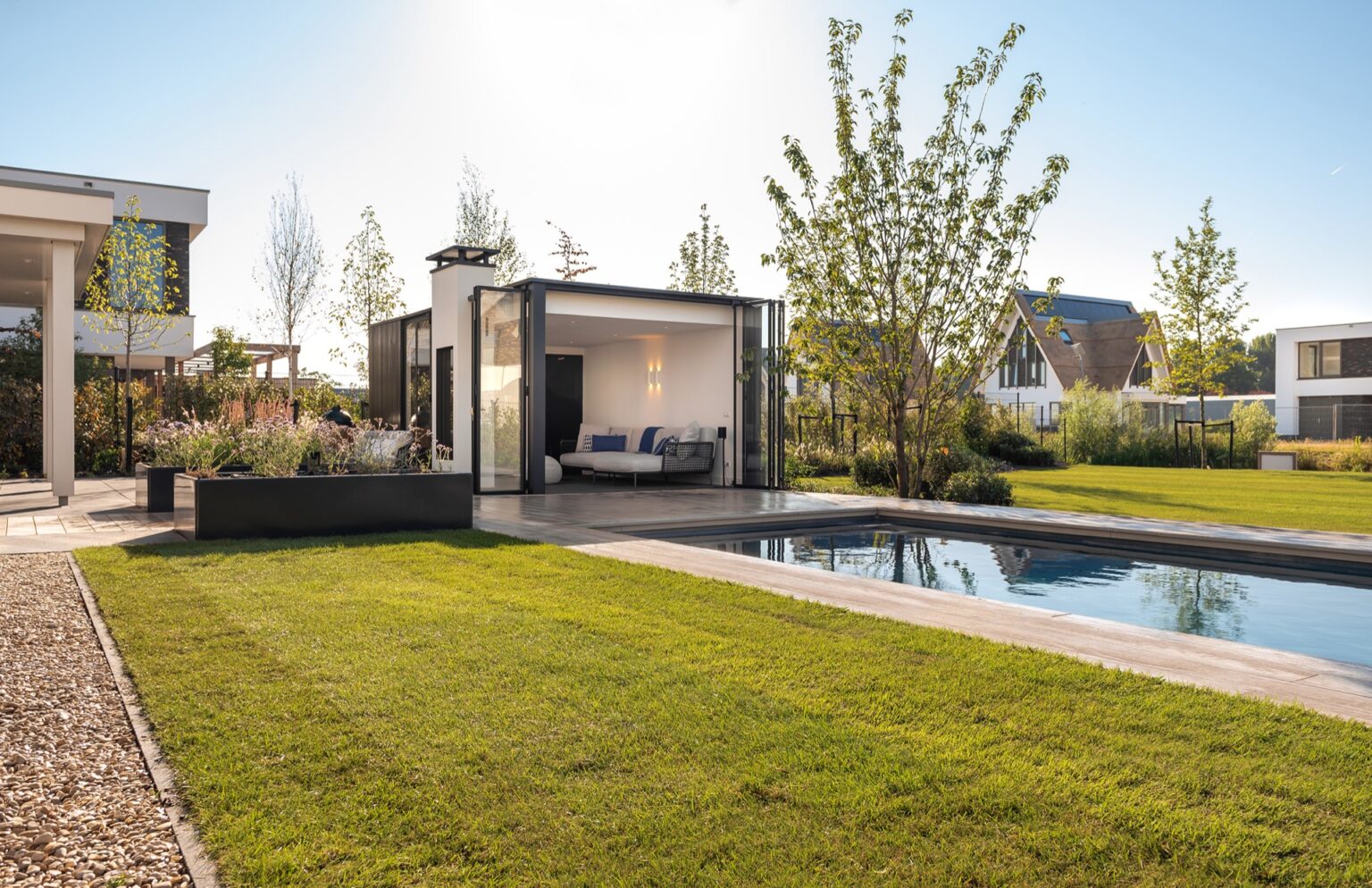 Pool house with beautiful see-through fireplace