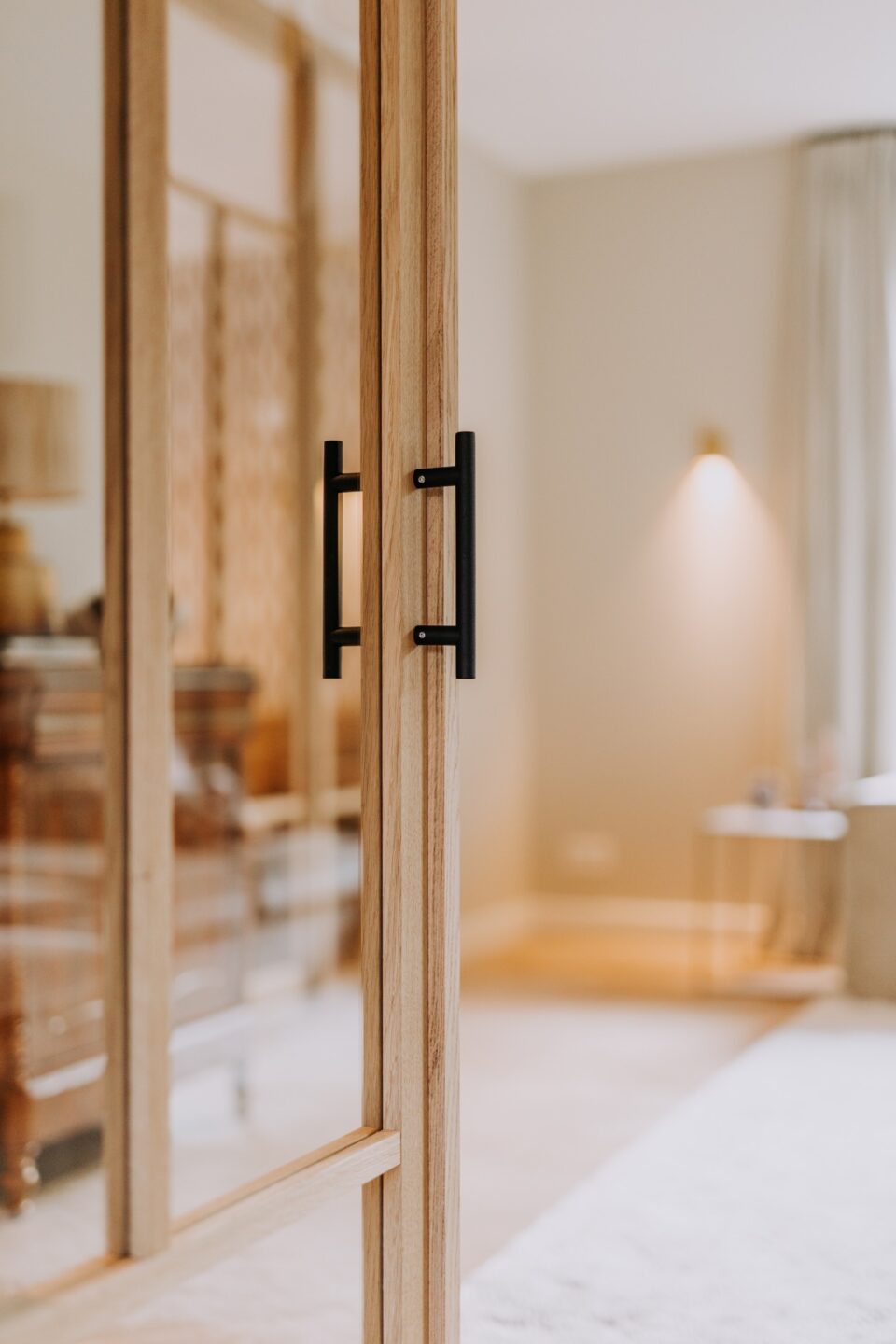 Creating light and space through oak interior doors with glass