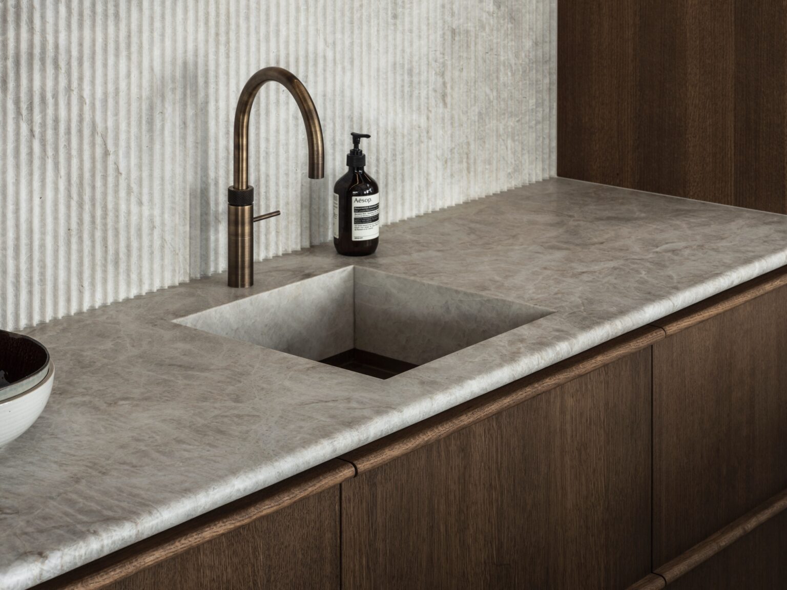 High-end kitchen with natural materials & luxurious details