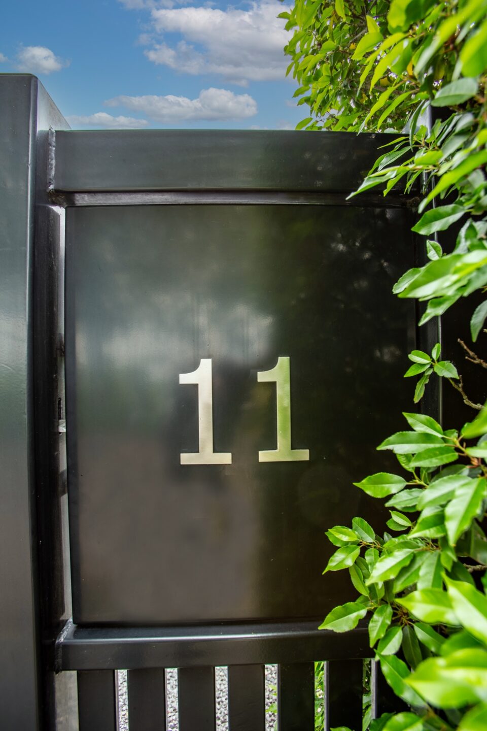 Sleek modern entrance gate + walkway