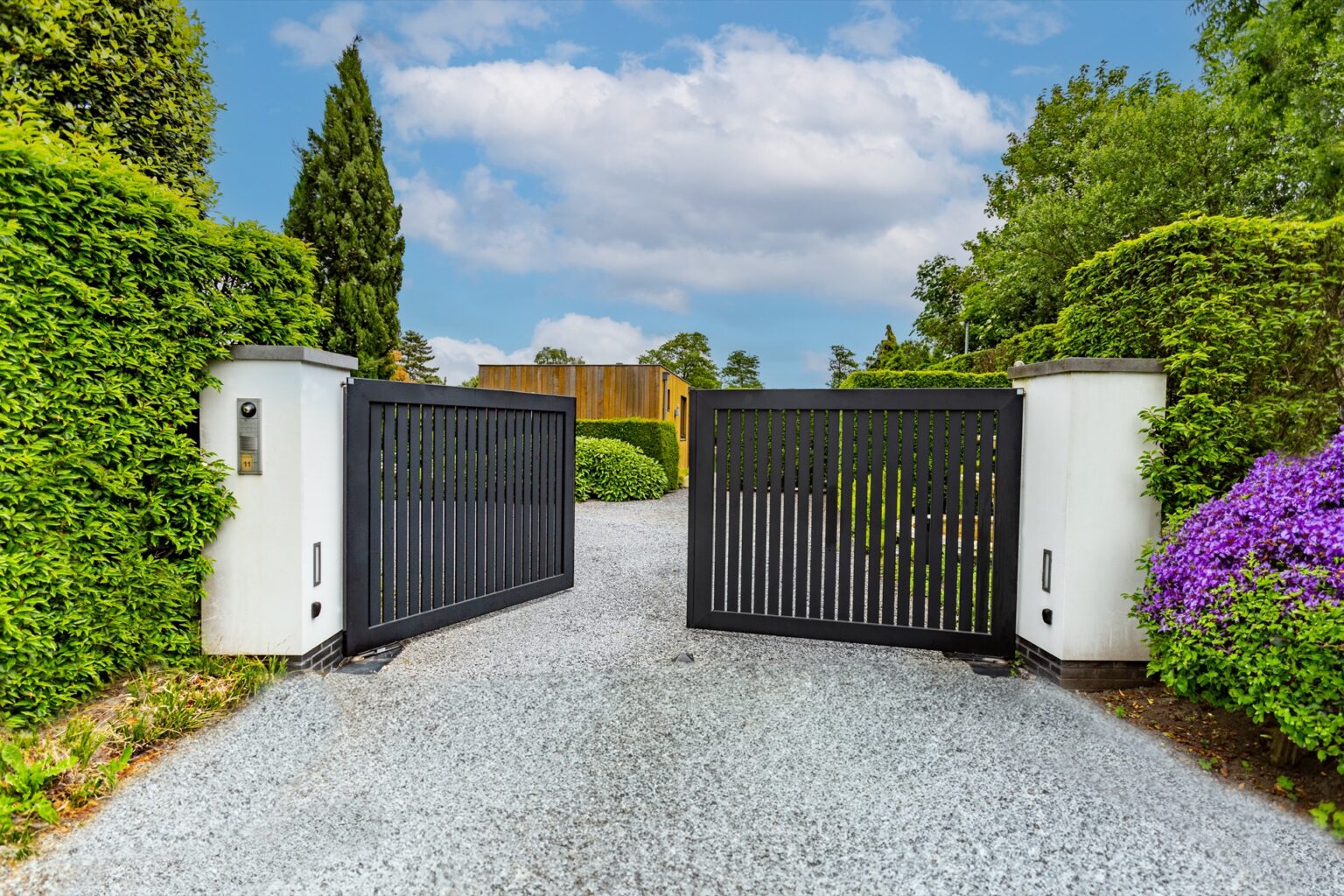 Sleek modern entrance gate + walkway