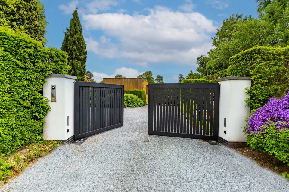 Sleek modern entrance gate + walkway