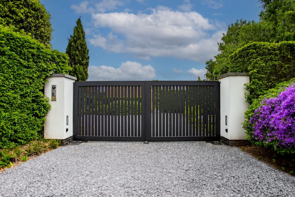 Sleek modern entrance gate + walkway