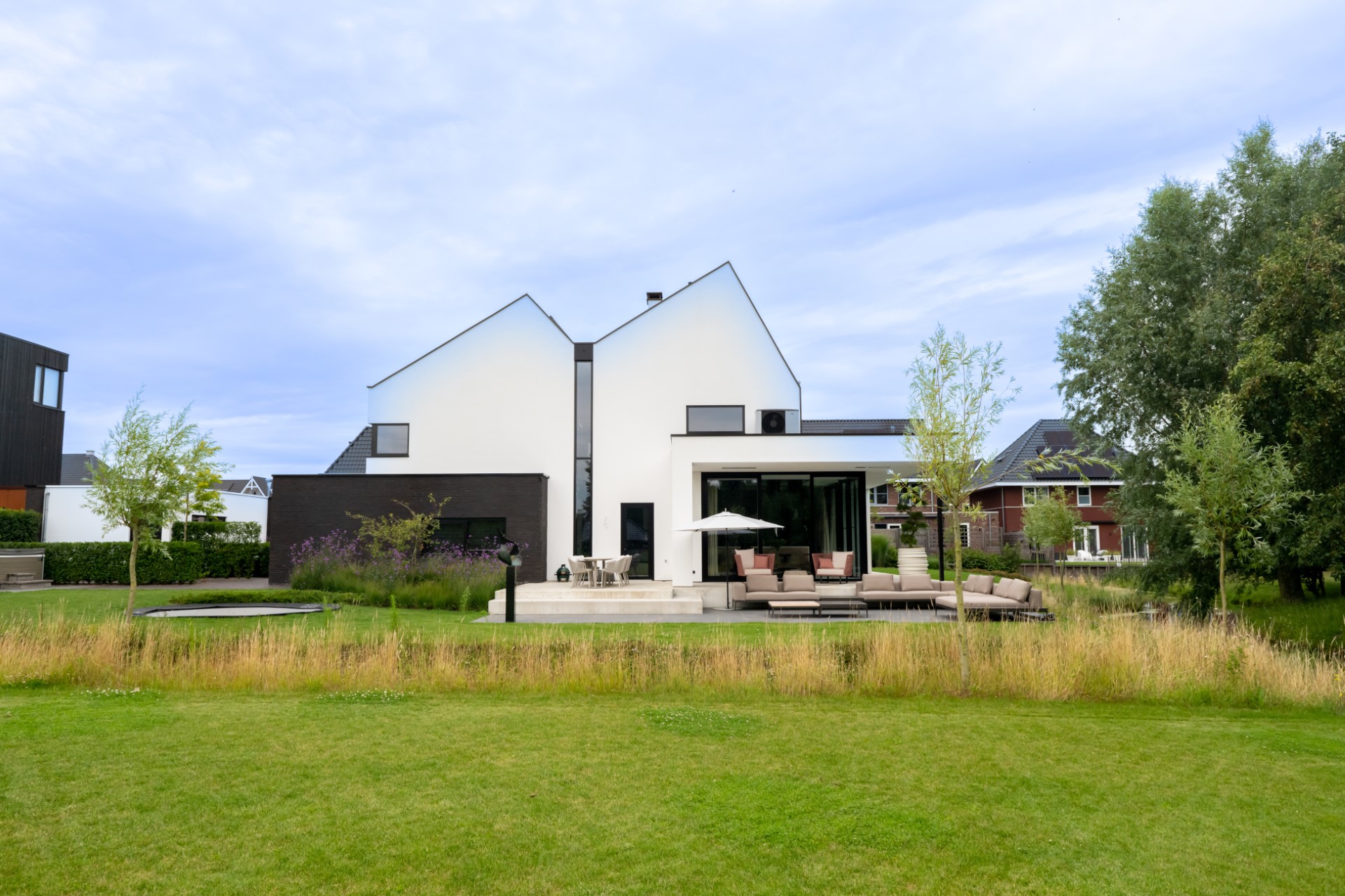 Een onderhouds- vriendelijke familie tuin van John Koomen