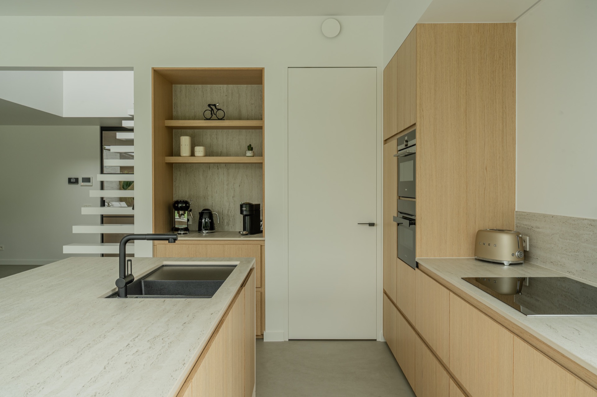 Dekton Marmorio in kitchen and bathroom